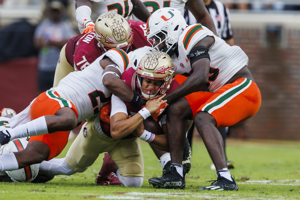 No. 4 Florida State beats Miami 27-20 to win its 16th straight and ...
