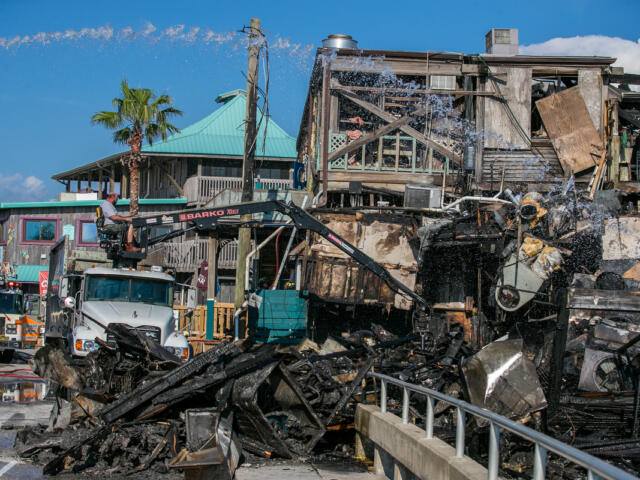 PHOTOS & VIDEO: Firefighters address remaining hot spots at Cedar Key ...