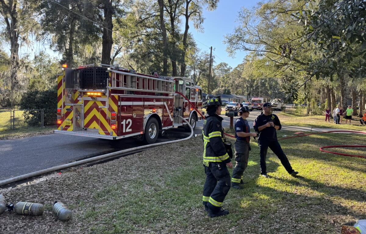 Firefighters save woman trapped inside house fire - 352today